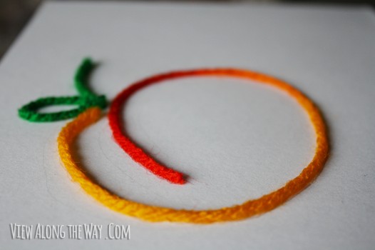 Easy Yarn Art Project: How to make art with yarn and paper